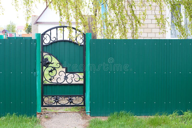 Entry Gates and Aztec Profile Fence Stock Photo - Image of gate, line ...
