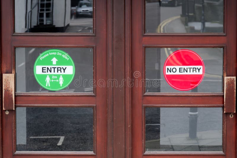 Entry and No Entry Sight on Shop Door for Customer Segregation Stock ...