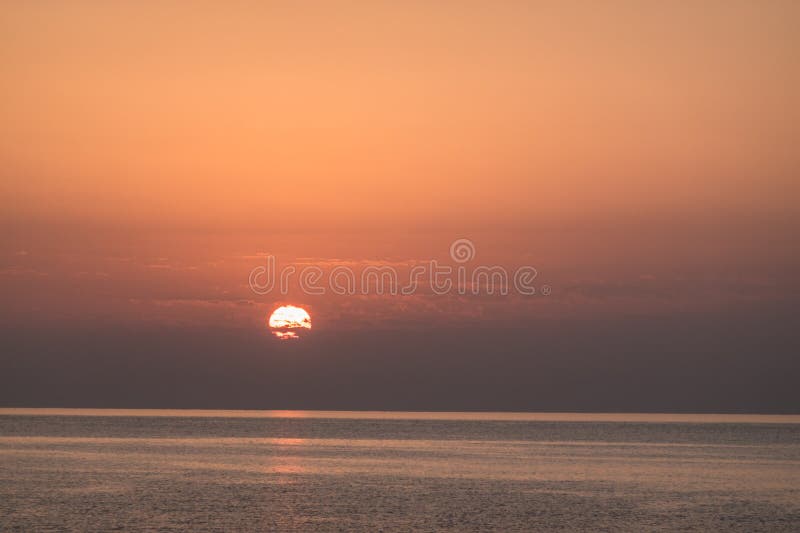 Entwined Sun with Small Clouds during Sunrise at the Red Sea Stock ...