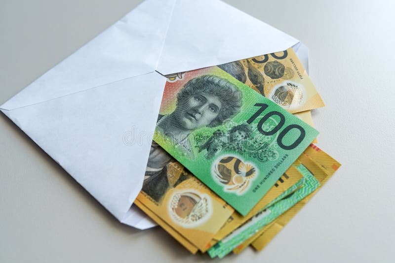 Australian Notes Under a Magnifying Glass in Hand Stock Photo - Image ...