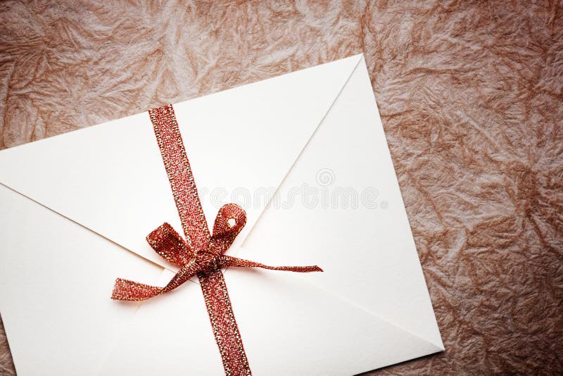 Envelope with a red ribbon stock image. Image of message - 23661183