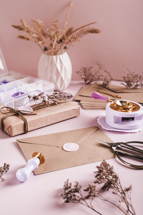 An Envelope Sealed with Wax and a Craft Kit on the Table Vertical View Stock Photo - Image of ...