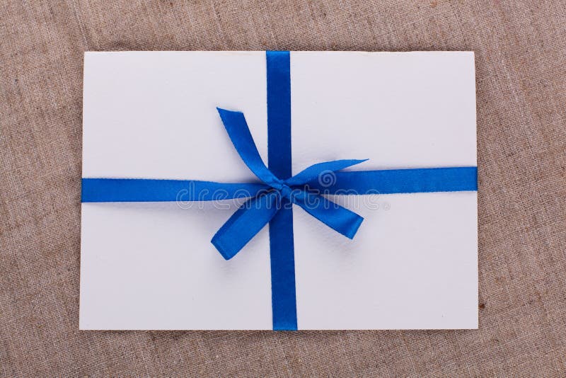 The Envelope Tied with a Blue Ribbon on Sacking Stock Photo - Image of ...