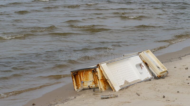 Old, Rusty Fridge on the Beach Stock Photo - Image of concept, garbage ...