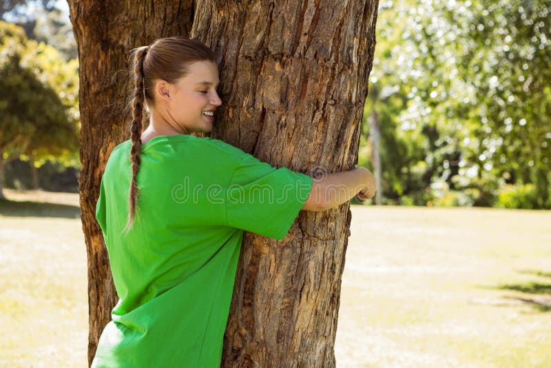 Environmental Activist Hugging a Tree in the Park Stock Photo - Image ...