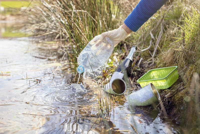 Environmental Conservation Collecting Garbage and Trash from Water ...