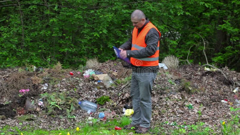 Environmental Officer Writes in Polluted Park Stock Video - Video of ...