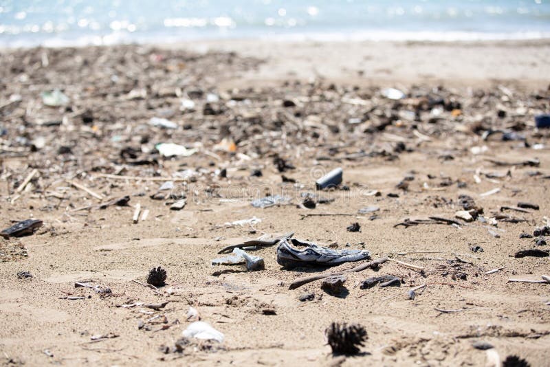 Environmental Pollution, Beached Garbage and Old Shoes Stock Photo ...