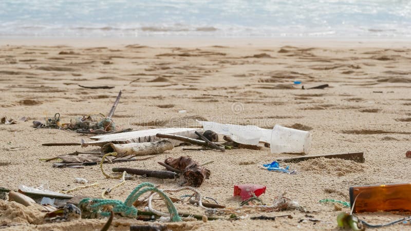 Garbage on sand beach stock image. Image of industry - 187481271