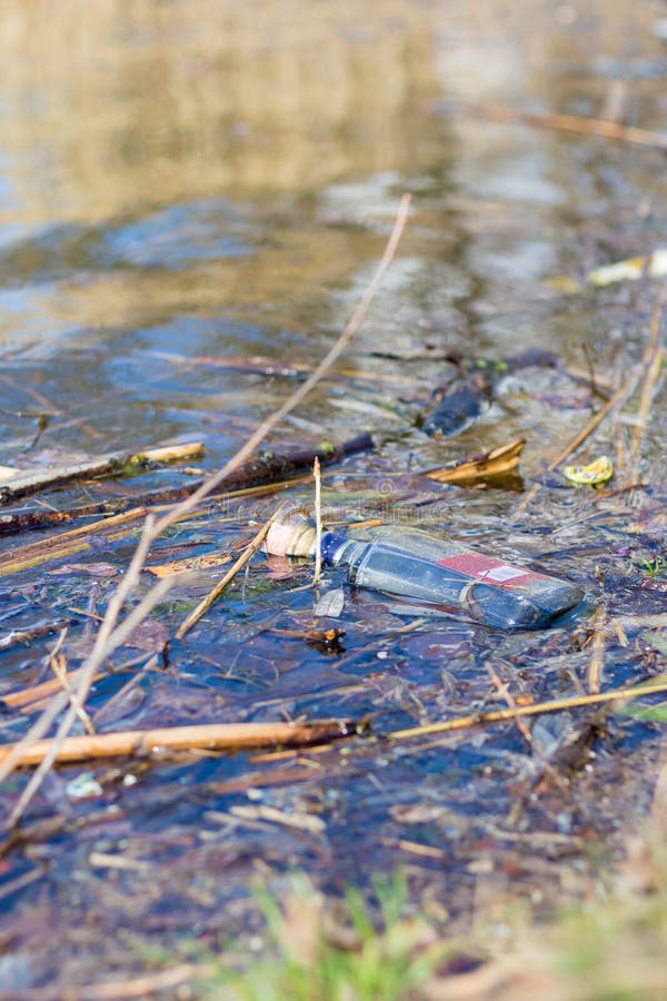Environmental Pollution. Trash in the Lake Stock Photo - Image of ...