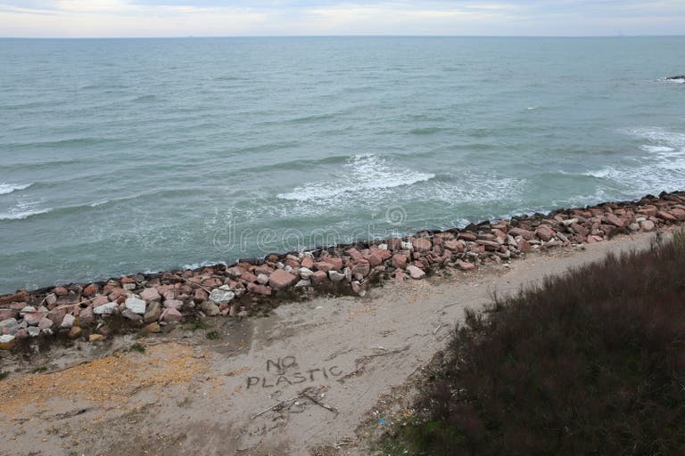 Environmental Problem. Ecology Concept. Plastic on the Beach with Sos ...