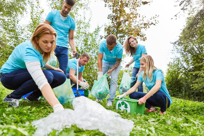 Environmental Protection Group Collecting Rubbish in Nature Stock Photo ...