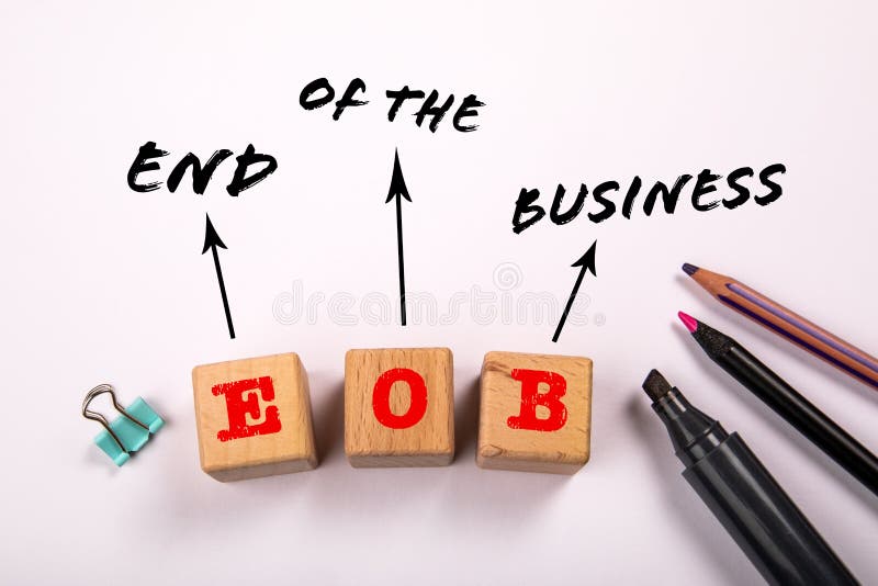 EOB- End of the Business. Wooden Blocks on a White Office Table Stock ...