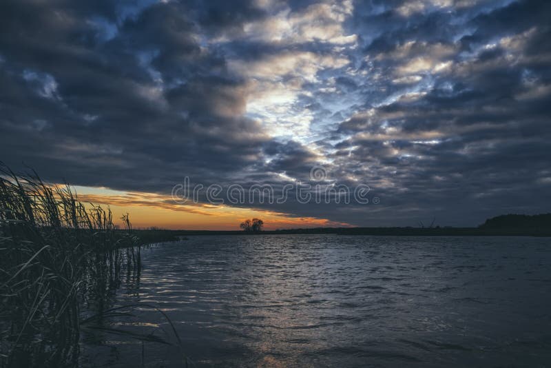 Epic sunset on the lake stock photo. Image of water - 184223108