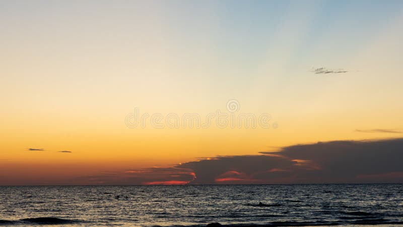 Epic Sunset Sky with Rays of Light from Horizon Above Ocean Stock Image ...