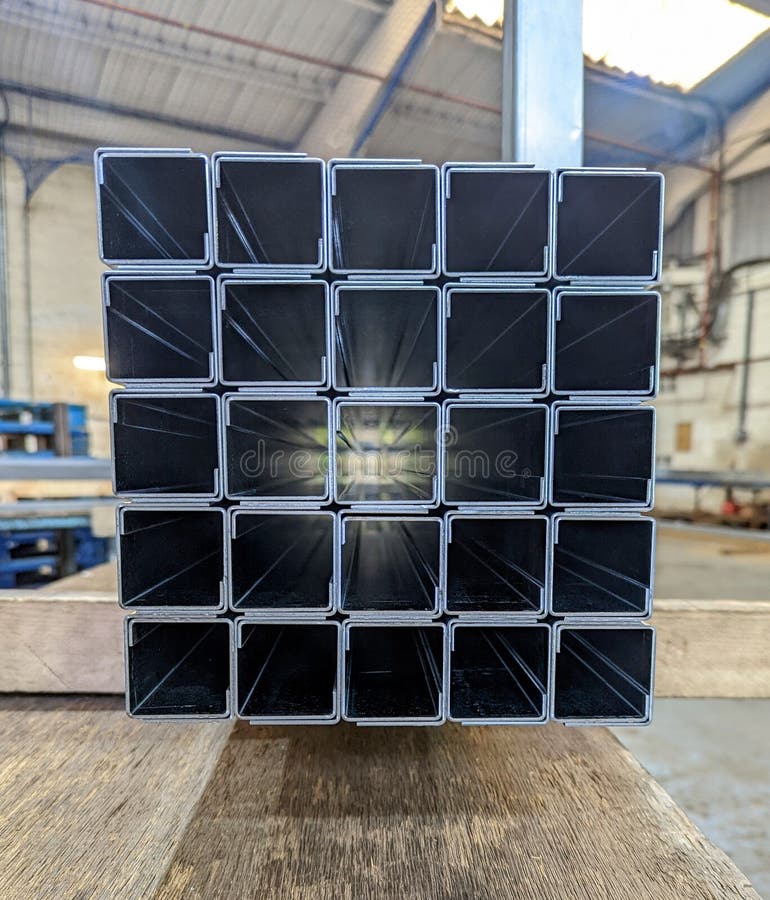 Equal Stack of Square Pipes at a Construction Site Stock Image - Image ...