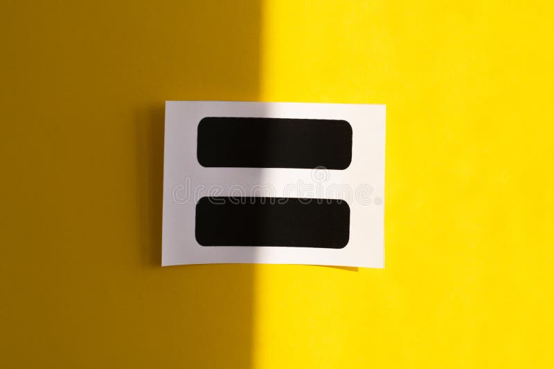 The Equals Sign with a Shadow on a Yellow Background Stock Image ...