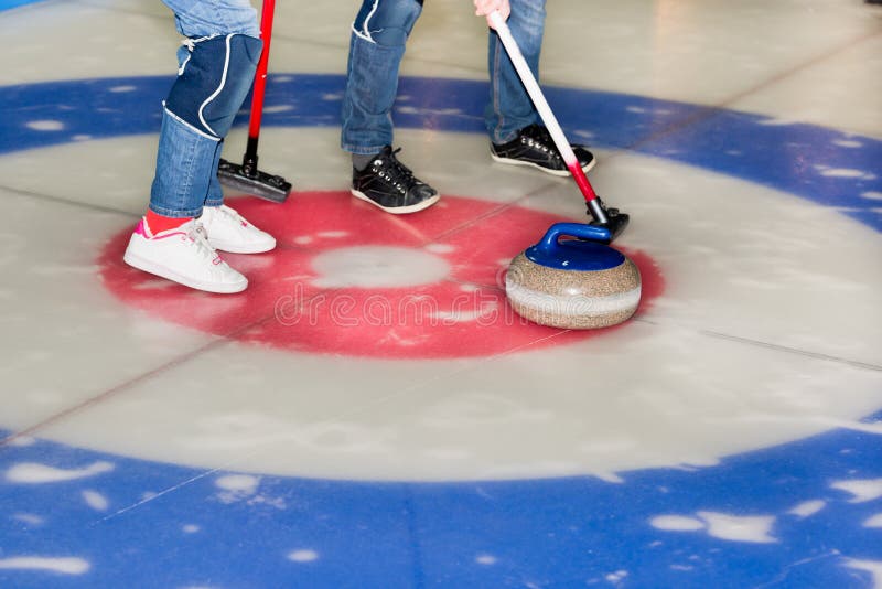 Curling stones on the ice stock photo. Image of cold - 117326554