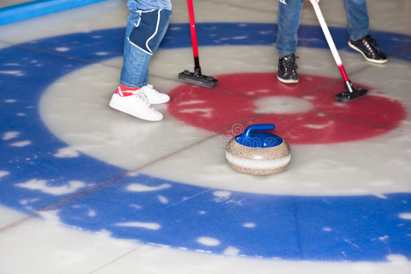 Curling stones on the ice stock image. Image of slide - 117359965