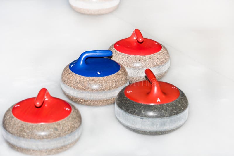 Curling stones on the ice stock image. Image of curling - 117619539