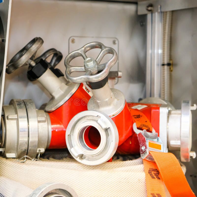 Rescue Fire Truck Equipment. Compartment of Rolled Up Fire Hoses on a ...