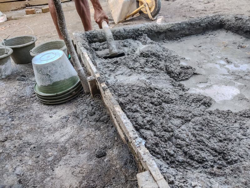Construction Site with Concrete Mixing Buckets and Tools in Outdoor ...