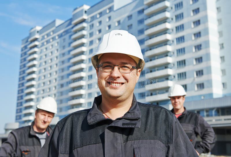 Constructores Felices En El Emplazamiento De La Obra Foto de archivo ...