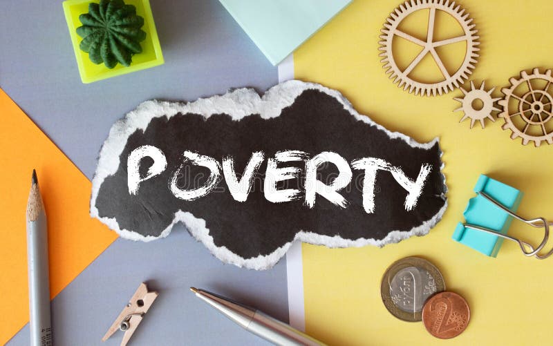 The Word `poverty` Written on Cardboard, Isolated on a Blue Background ...