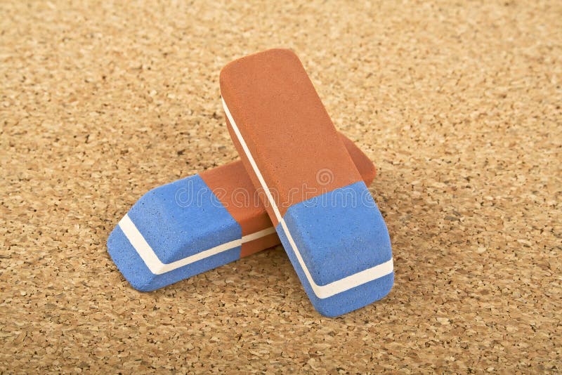 Erasers on a cork board stock photo. Image of isolated - 174780060