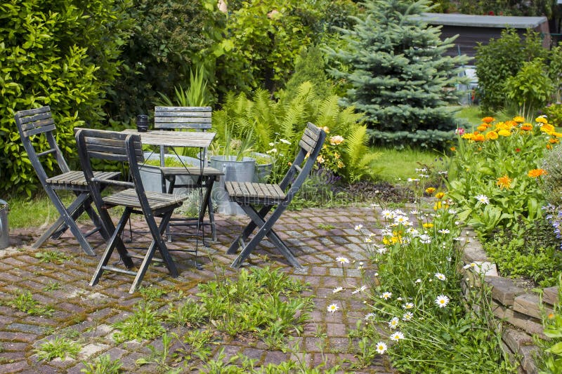 Erb Spiral in the Garden and Table with Chairs Stock Image - Image of ...