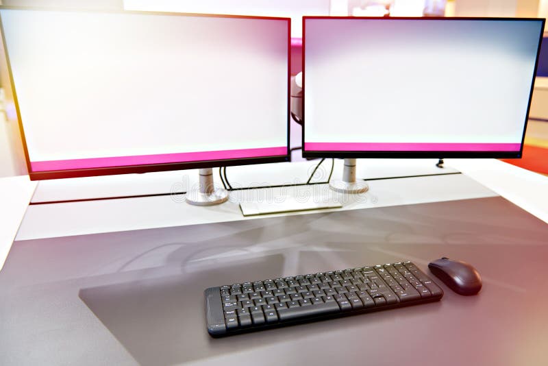Ergonomic Workplace with Keyboard and Monitors Stock Image - Image of ...