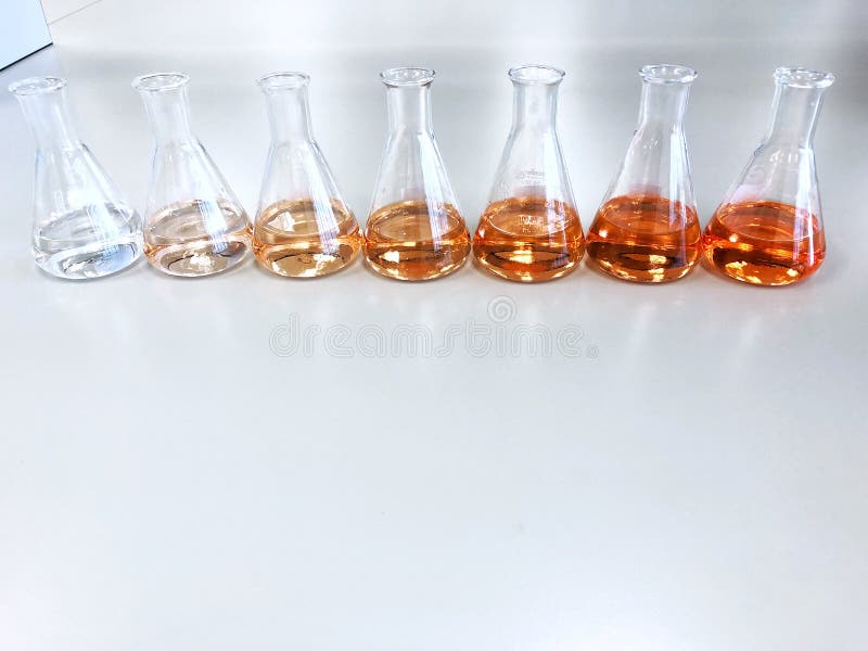 The Erlenmeyer or Conical Flask on Bench Laboratory, with Purple ...