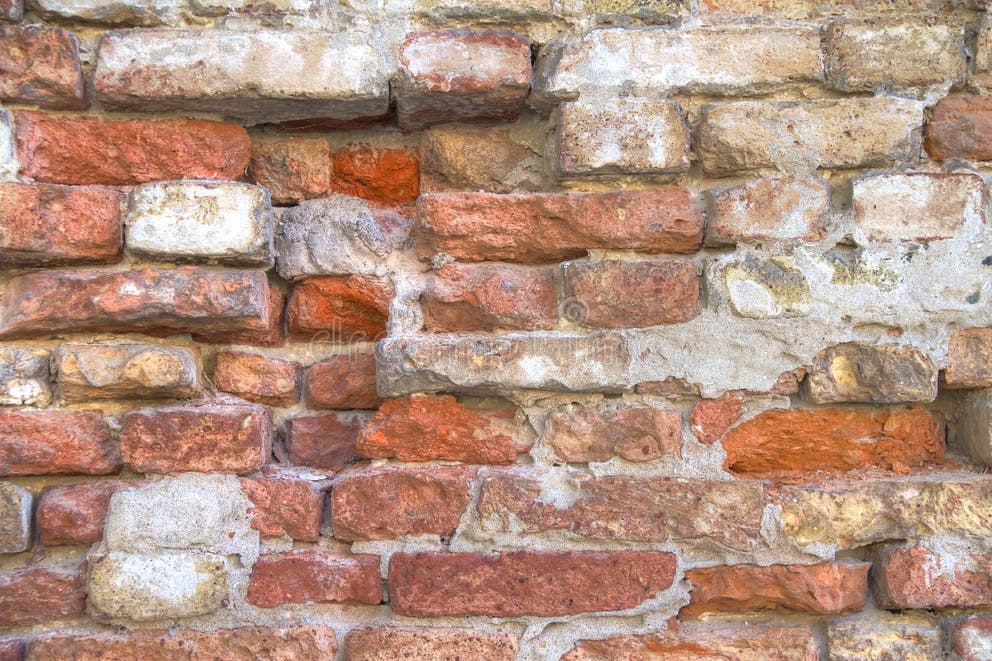 Eroded Brick Wall Texture stock photo. Image of texture - 98155928