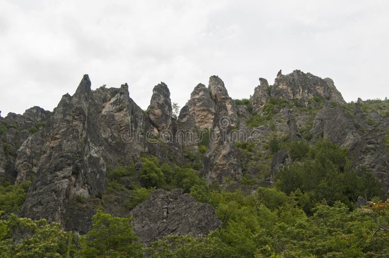 Eroded rocks in mountains stock image. Image of erode - 73176017