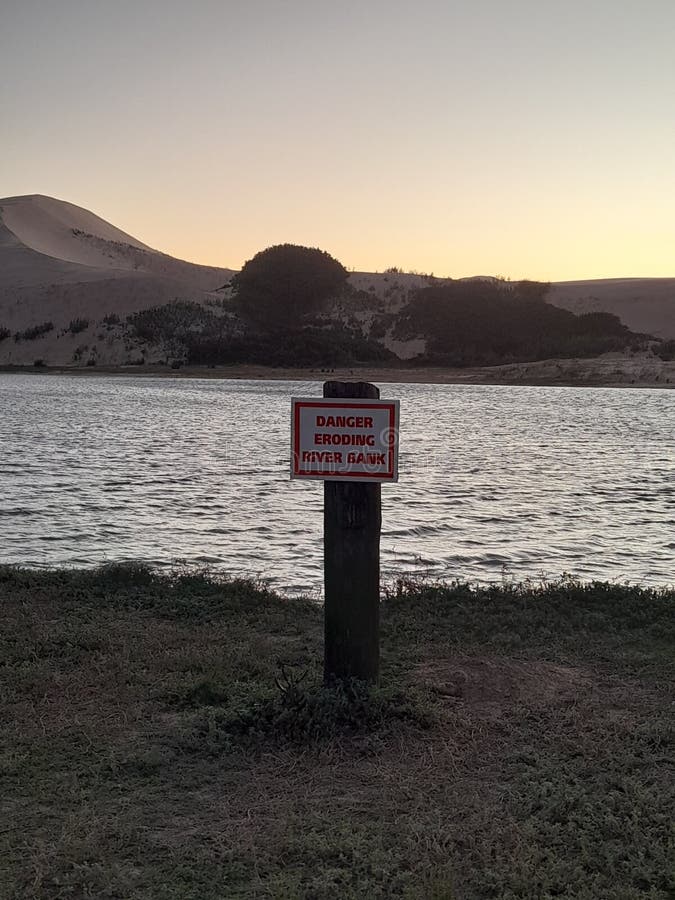 Eroding River Bank Warning Sign Stock Photo - Image of eroding, bank ...