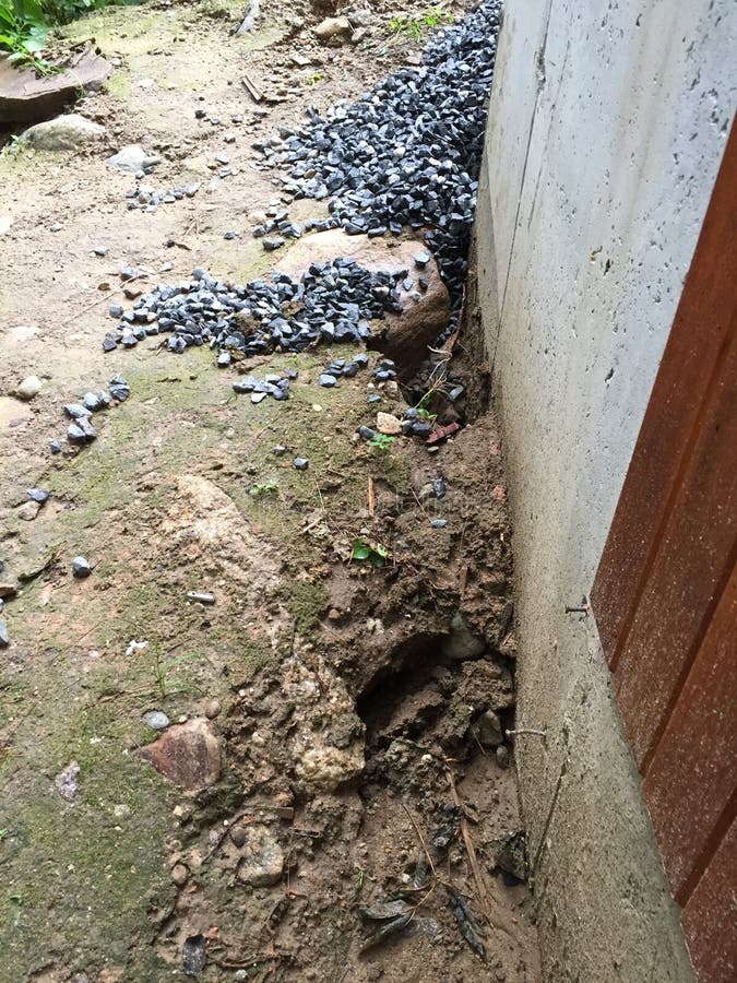 Erosion at House Foundation Stock Photo - Image of sink, drainage: 96106466