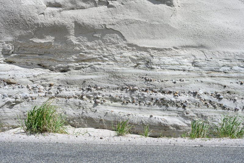 Erosion in Sandstone Rock Cliff, Tall Grasses at the Base, Patterns and ...