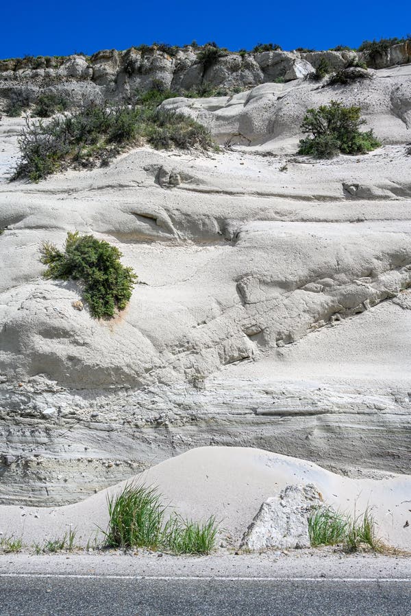 Erosion in Sandstone Rock Cliff, Tall Grasses at the Base, Patterns and ...