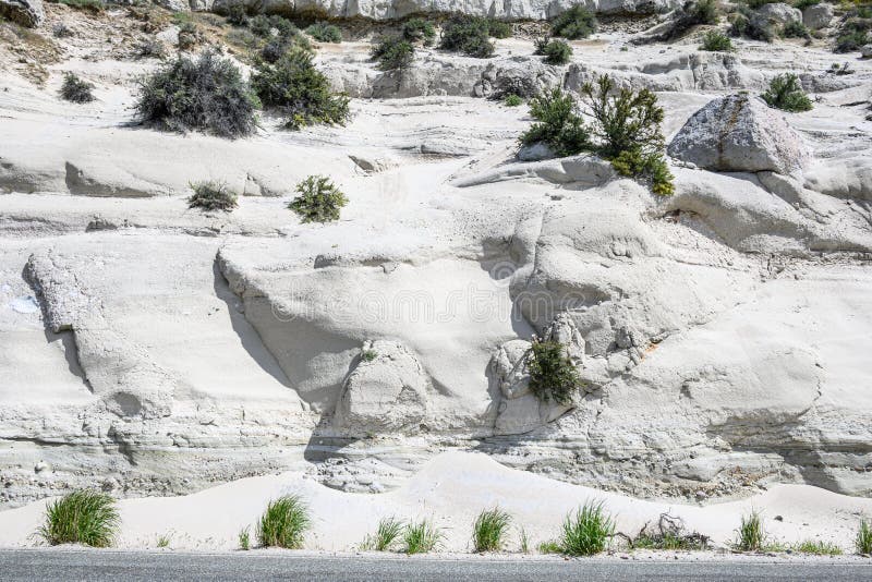 Erosion in Sandstone Rock Cliff, Tall Grasses at the Base, Patterns and ...