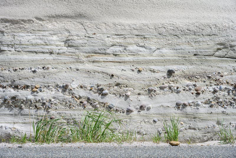 Erosion in Sandstone Rock Cliff, Tall Grasses at the Base, Patterns and ...