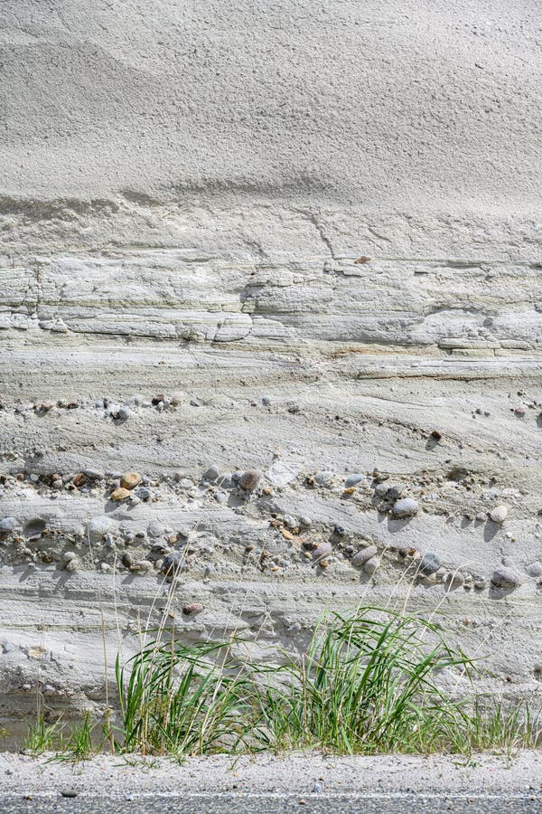 Erosion in Sandstone Rock Cliff, Tall Grasses at the Base, Patterns and ...