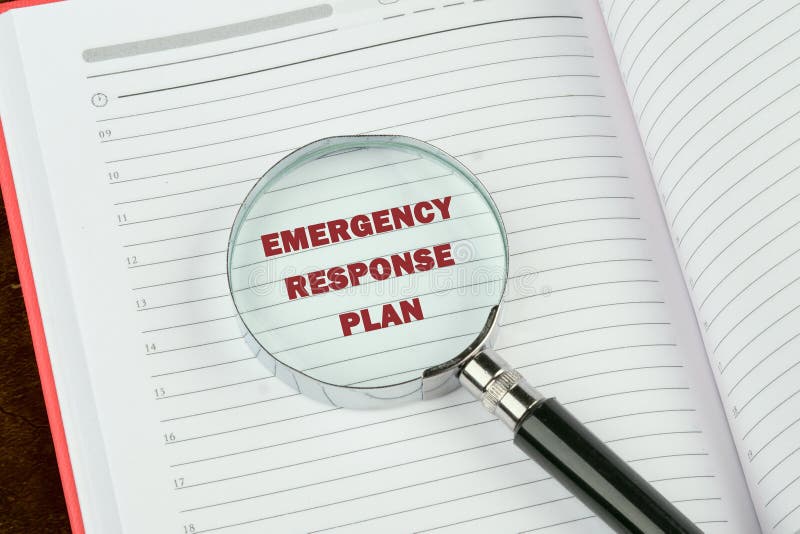 ERP As EMERGENCY RESPONSE PLAN Written through a Magnifying Glass on a ...