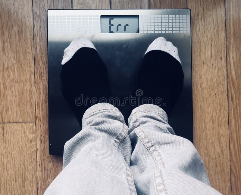 Man Getting On A Weighing Scale Stock Image - Image of athletic ...