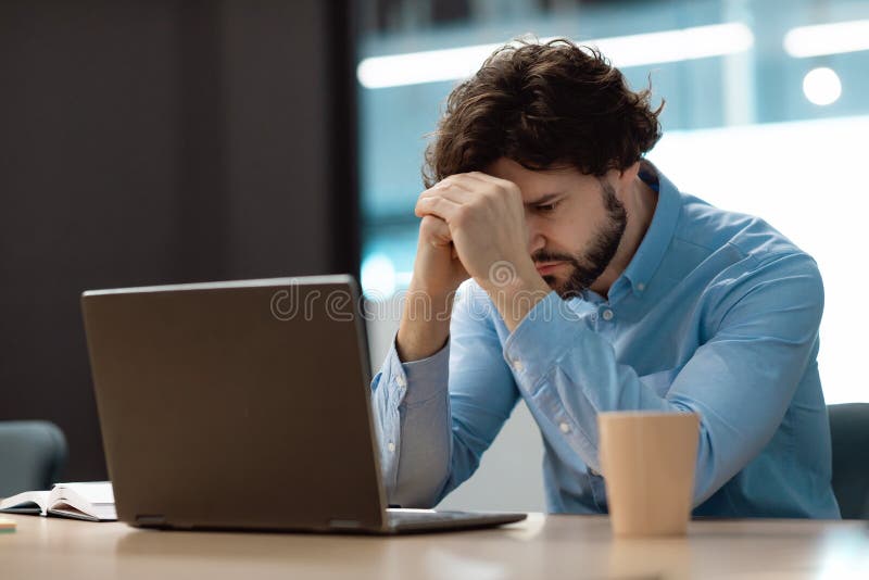 Sad Business Man Grabbing Head Using Laptop Stock Photo - Image of ...