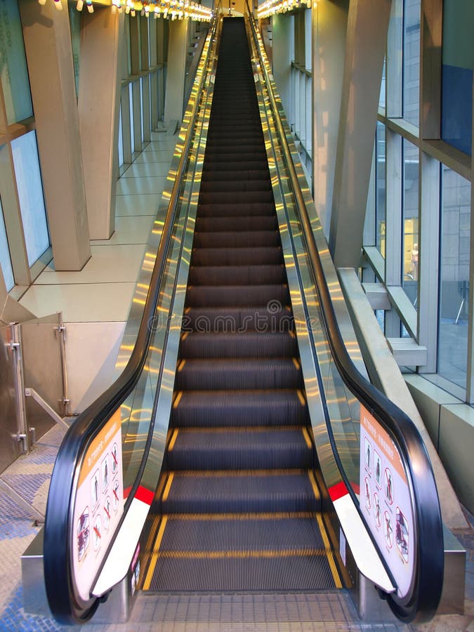 Escalator stock image. Image of lift, motion, metal, bright - 11927105