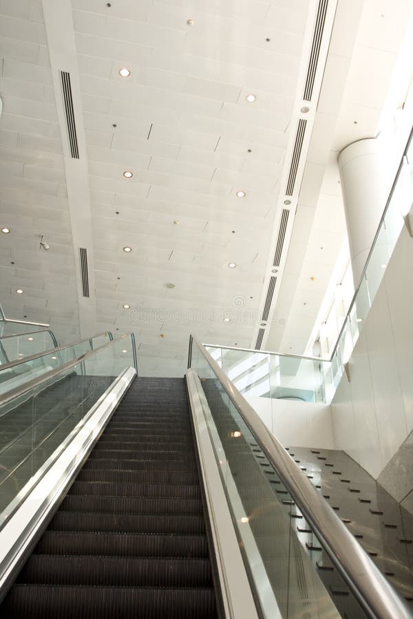 Escalator in a building stock photo. Image of city, business - 14146354