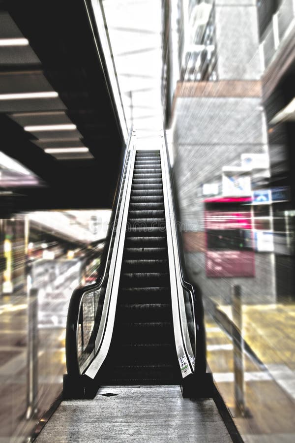 Escalator in a building stock photo. Image of blurred - 40844408