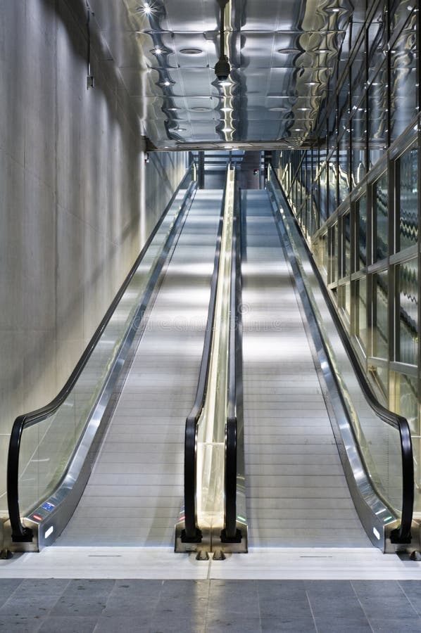 Escalator in glass & steel stock photo. Image of escalator - 31811724