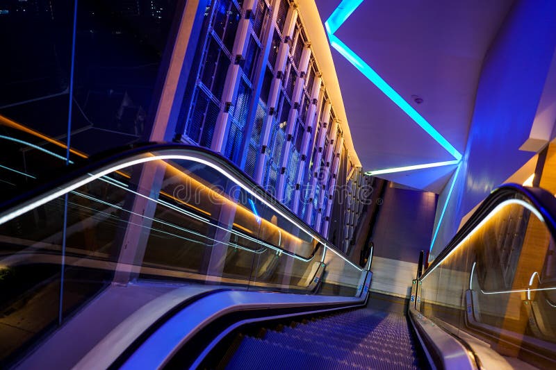 Escalator with LED Light beside in Technology Abstract Neon Colorful ...