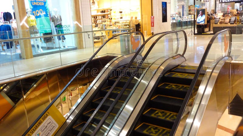 An escalator in a mall editorial image. Image of city - 272228440